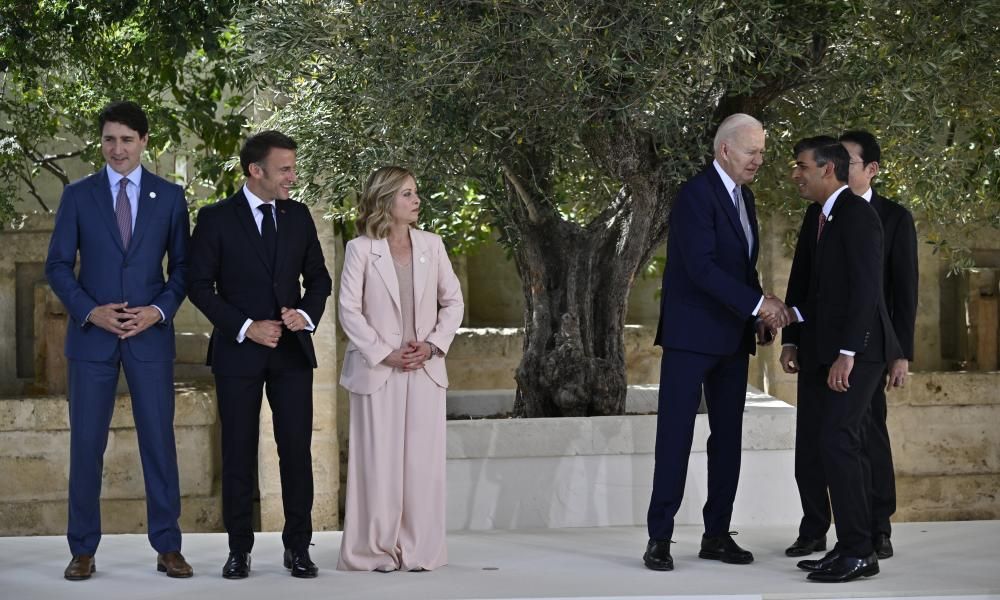 Meloni in the pink as she consoles procession of dead…