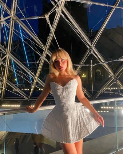 Sabrina Carpenter Stuns In Elegant White Frock…