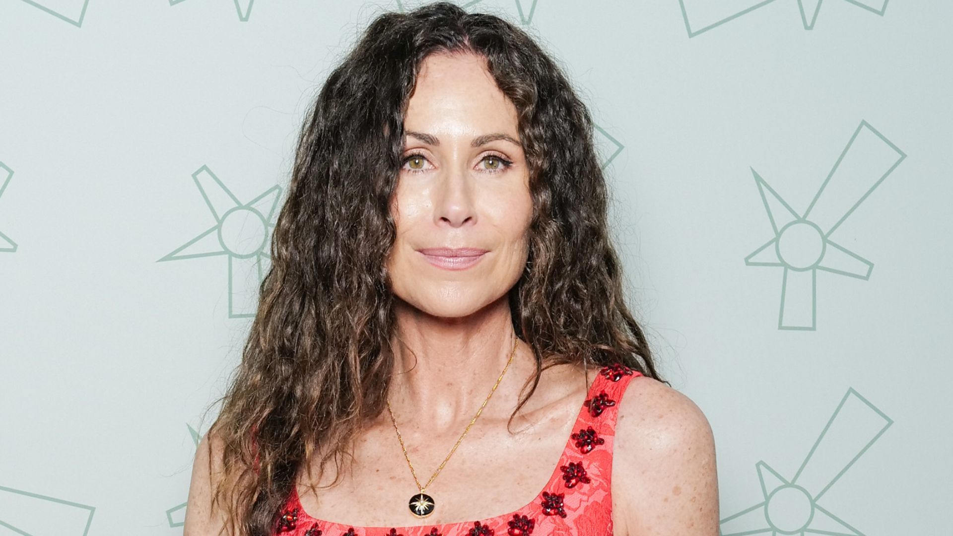 Minnie Driver's flawless red dress and eye-catching…