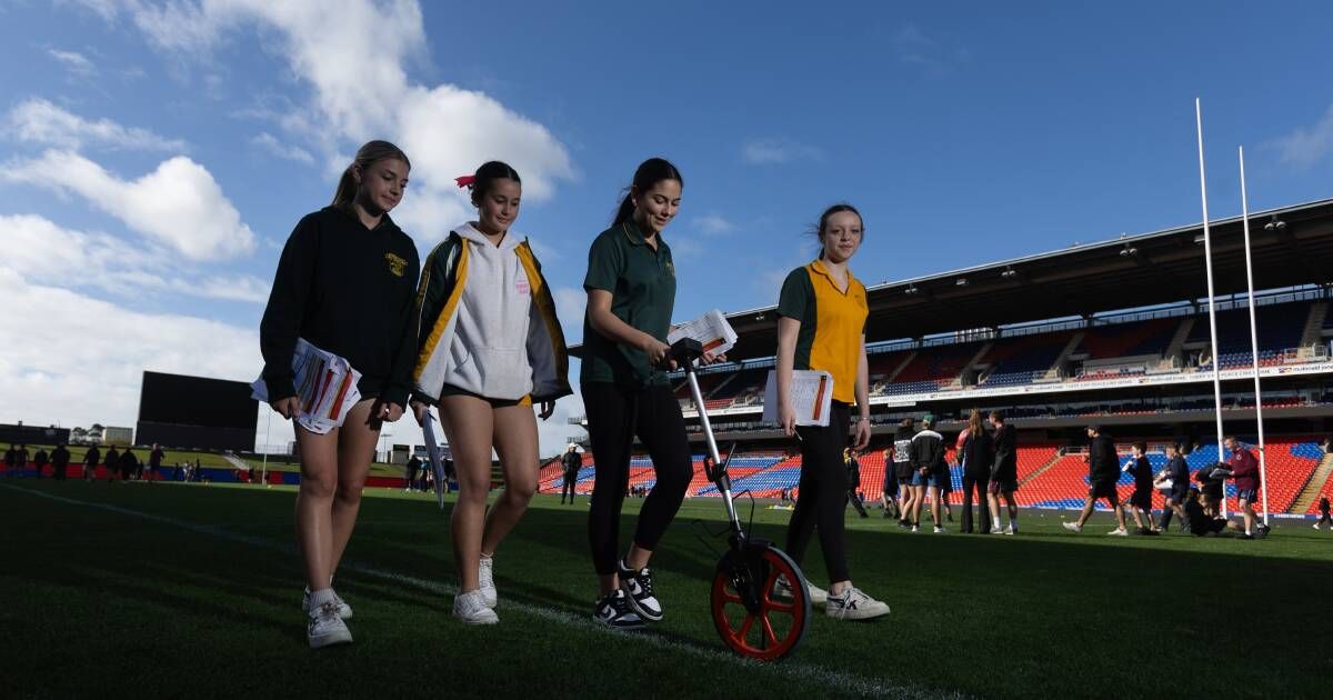 Kicking the footy and calculating numbers with the…