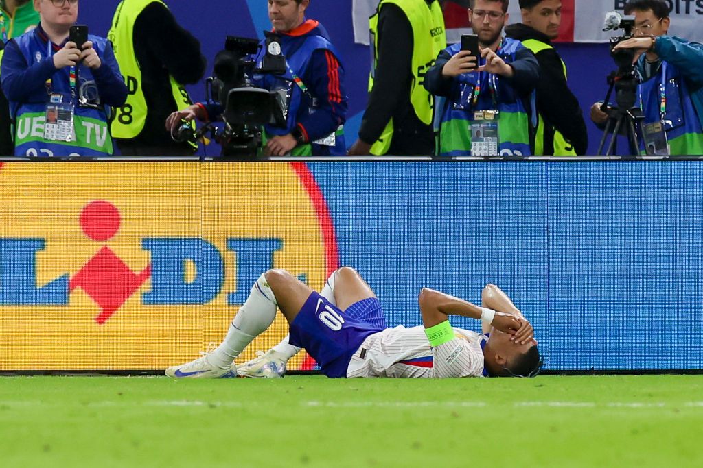WATCH: Kylian Mbappe receives another blow to the face…