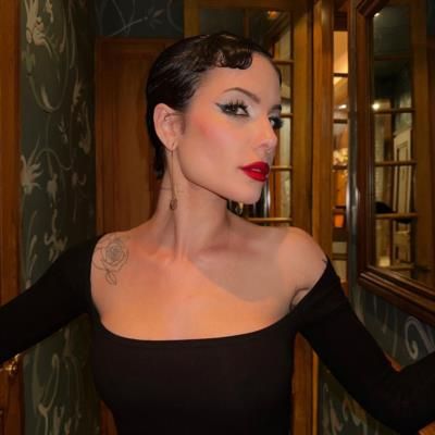Halsey Stuns In Bold Black Outfit With Red Lipstick