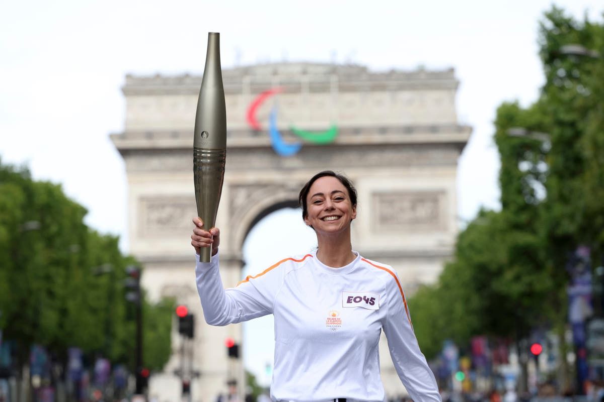 Who is carrying the Olympic torch through Paris? A BTS…