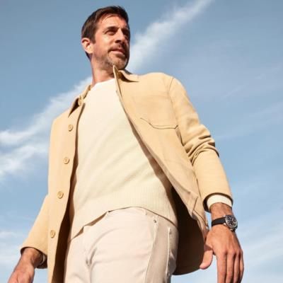 Aaron Rodgers Smiling For A Photo With Fans At Event