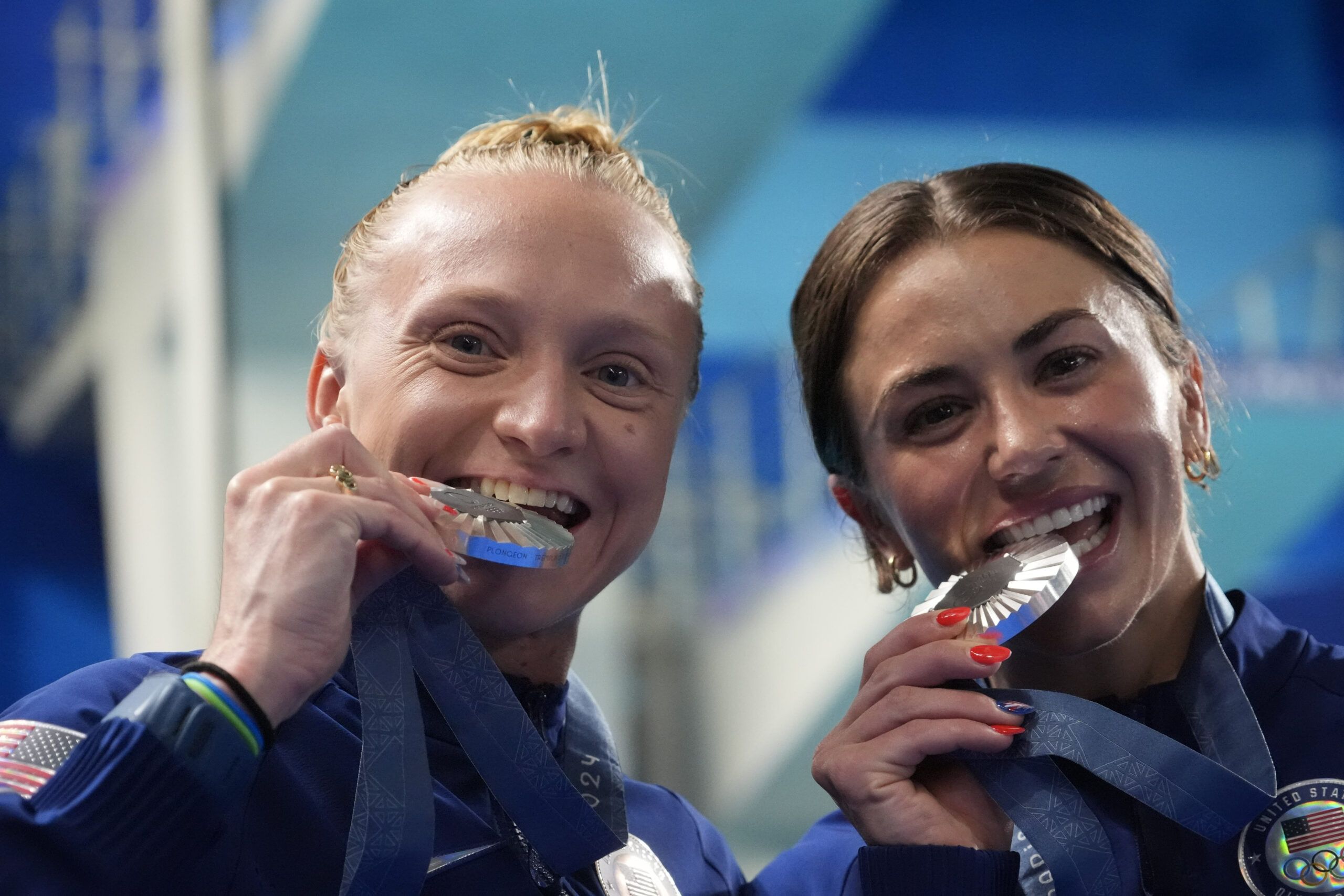 Why Olympic athletes are still biting their medals in…