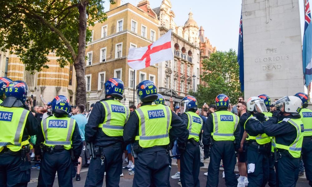 Riot police on standby across England and Wales for…