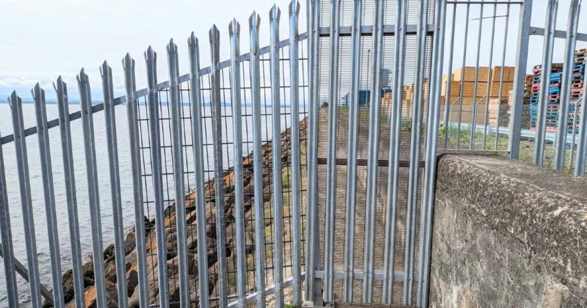 Locals rage at 'illegal' fence blocking public access…