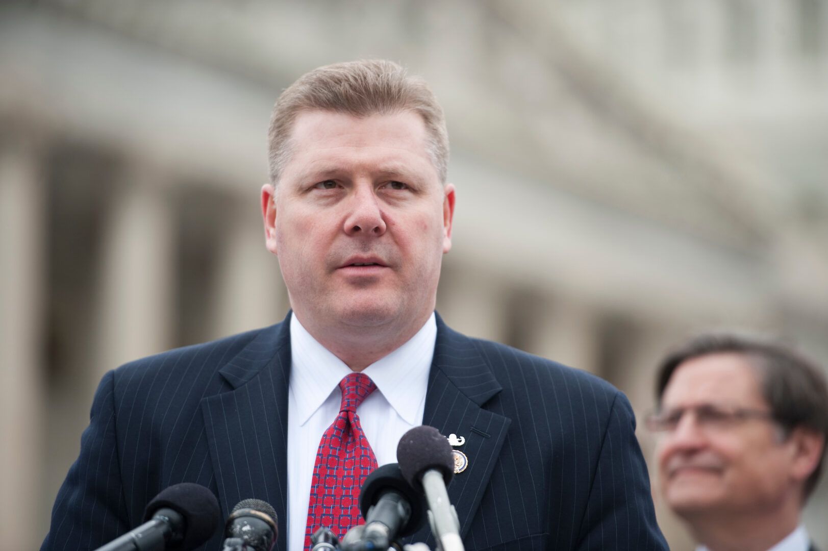 Crawford, former members argue in court for back pay