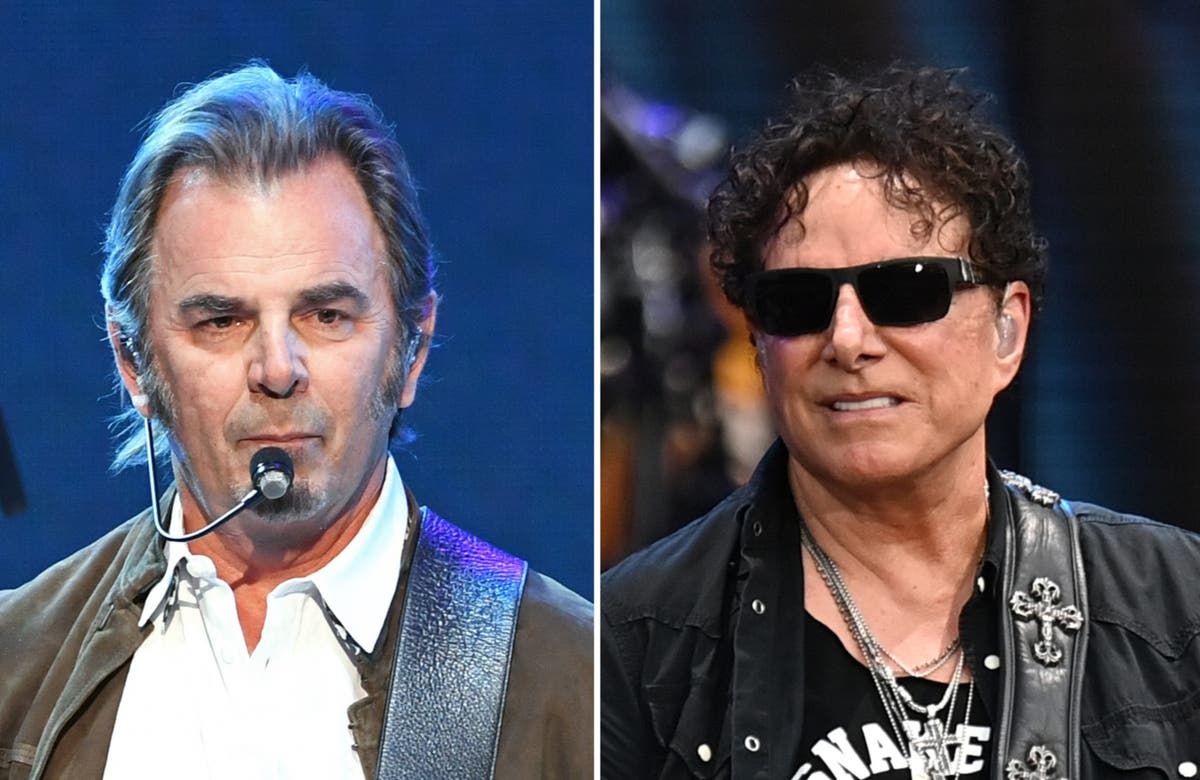 Journey members Jonathan Cain and Neal Schon resolve…