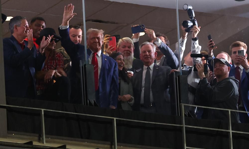 ‘Eating the Dawgs’: Trump hailed at Georgia-Alabama…