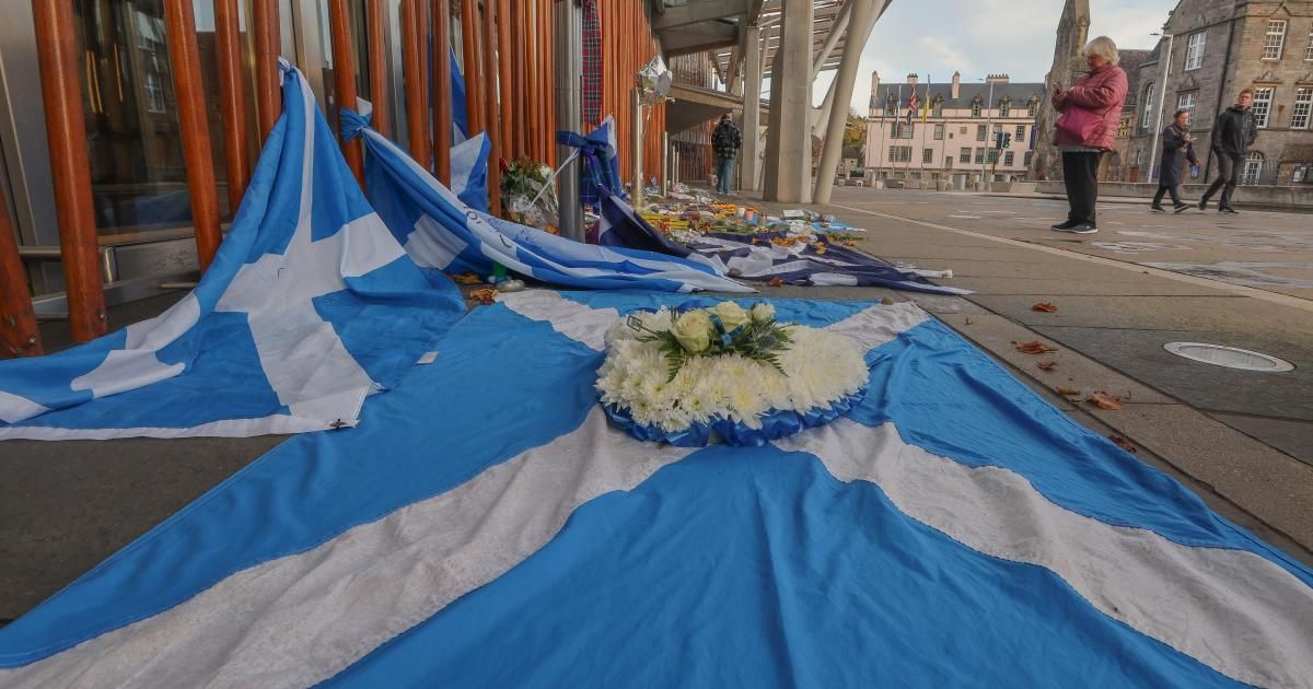 In pictures: Tributes laid for Alex Salmond outside…