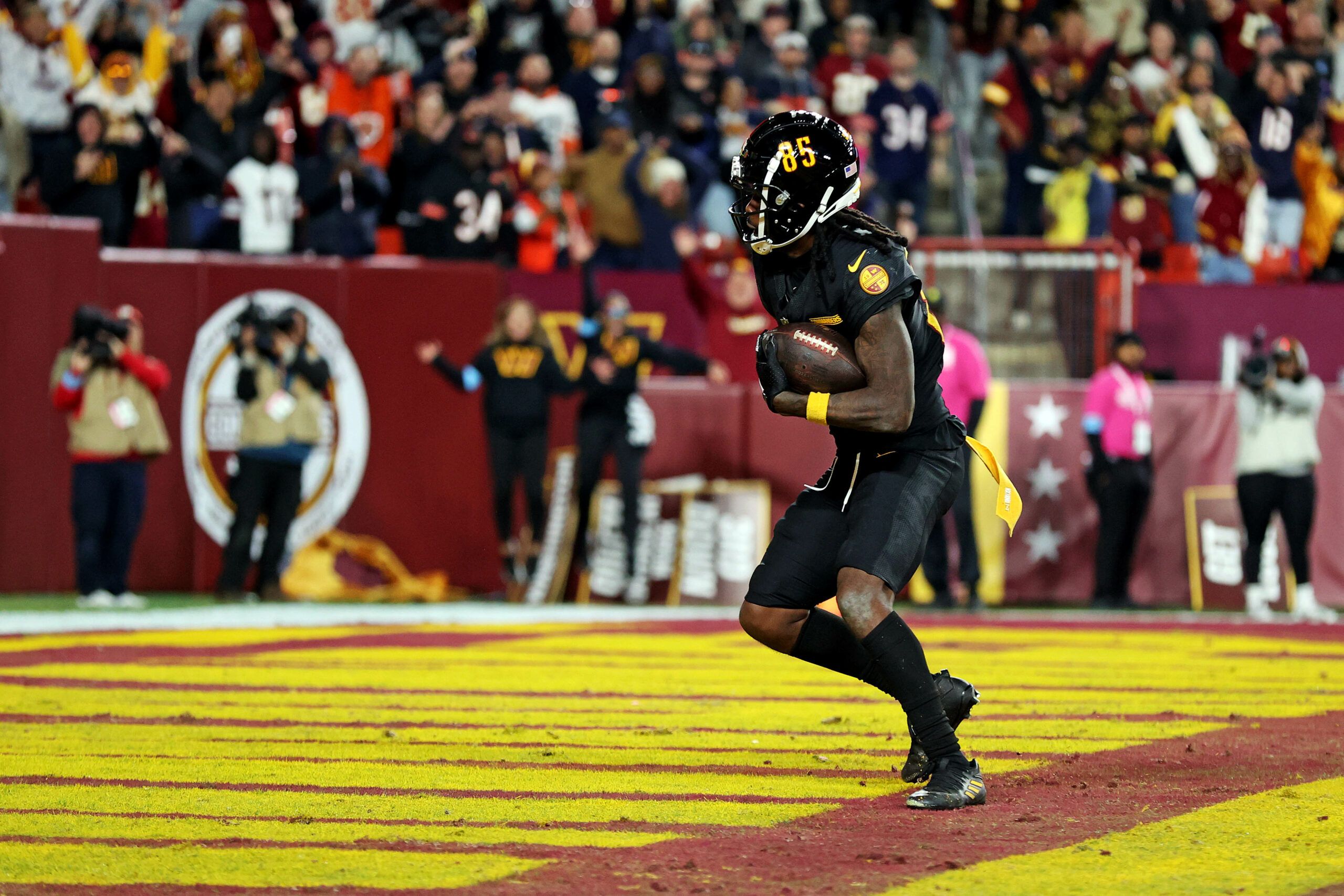 Jayden Daniels’ Hail Mary to Noah Brown as time…