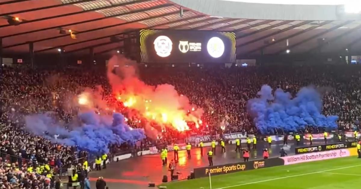 Watch as Motherwell & Rangers fans set off pyro…