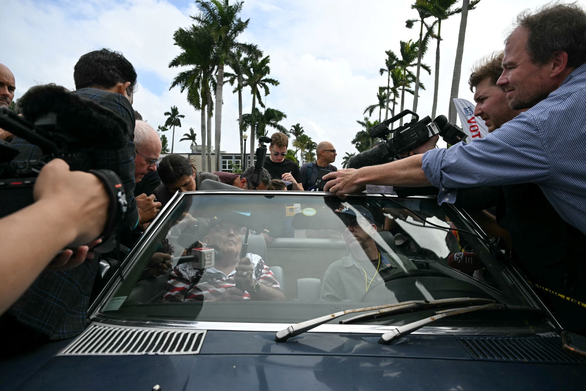 Rudy Giuliani Shows Up to Vote for Trump in Mercedes…