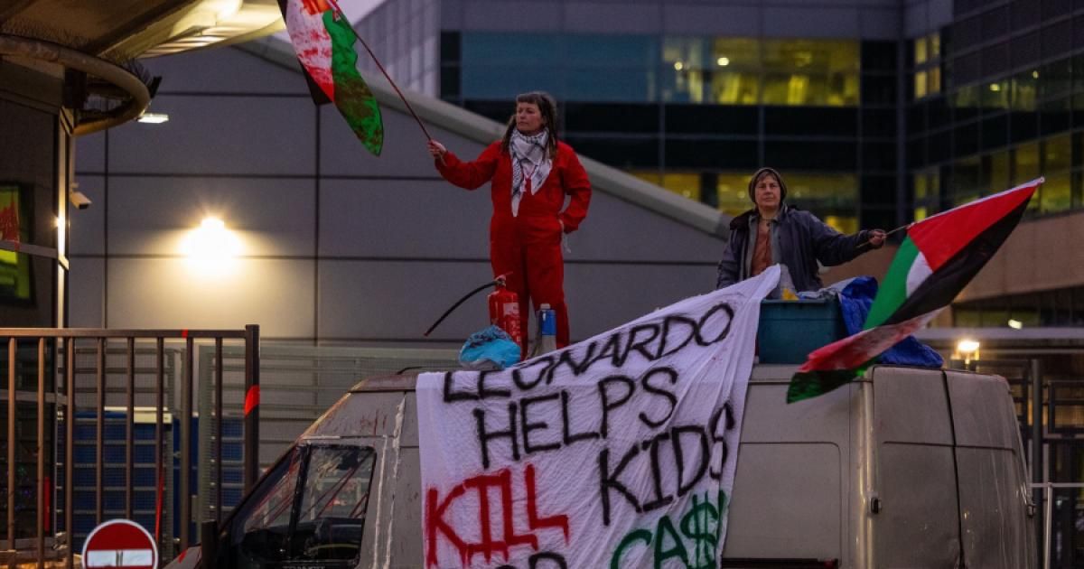 Pro-Palestine campaigners blockade entrance to…