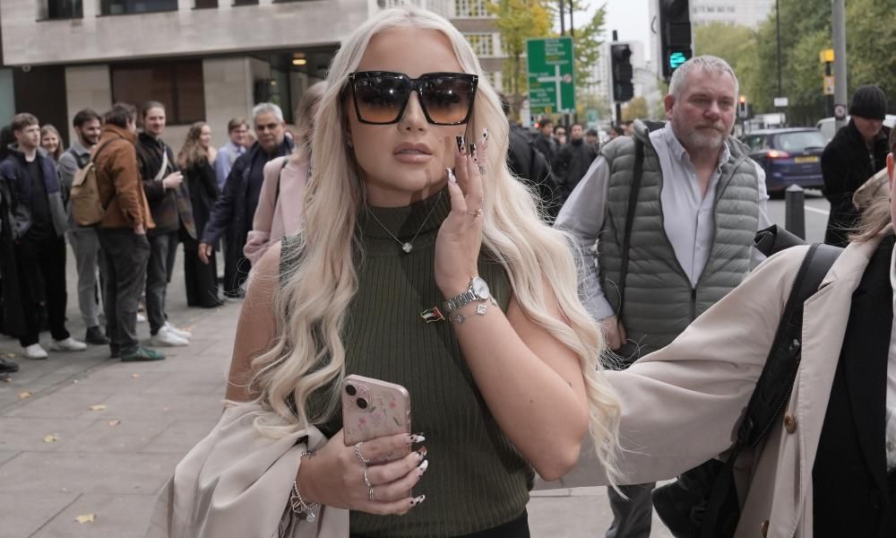 Woman who threw milkshake over Nigel Farage given…