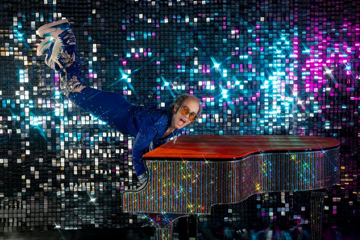Sir Elton John keyboard handstand waxwork unveiled at…