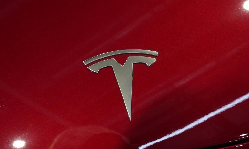 Tesla shares fall as company reports first decline in…