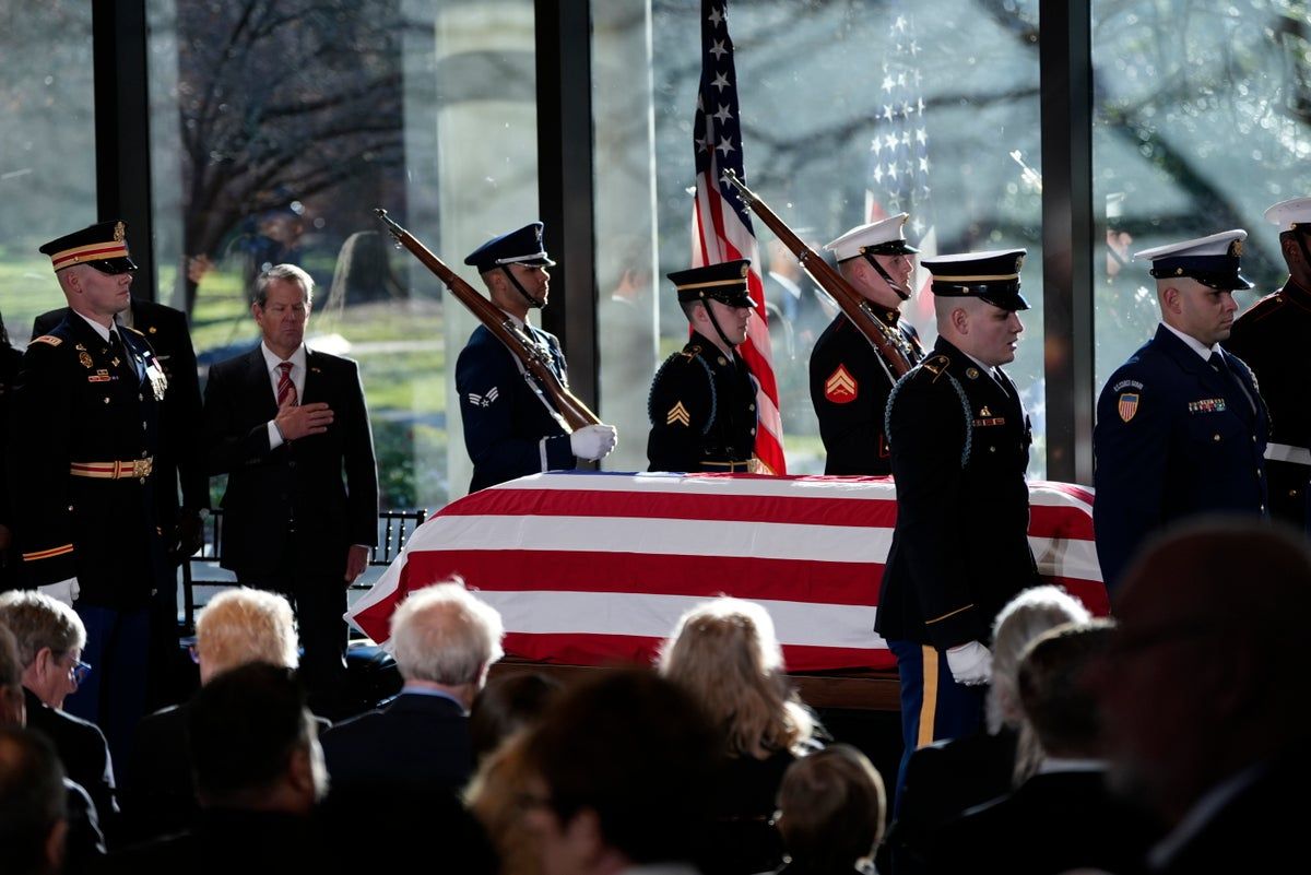 Jimmy Carter honored at memorial service after casket…