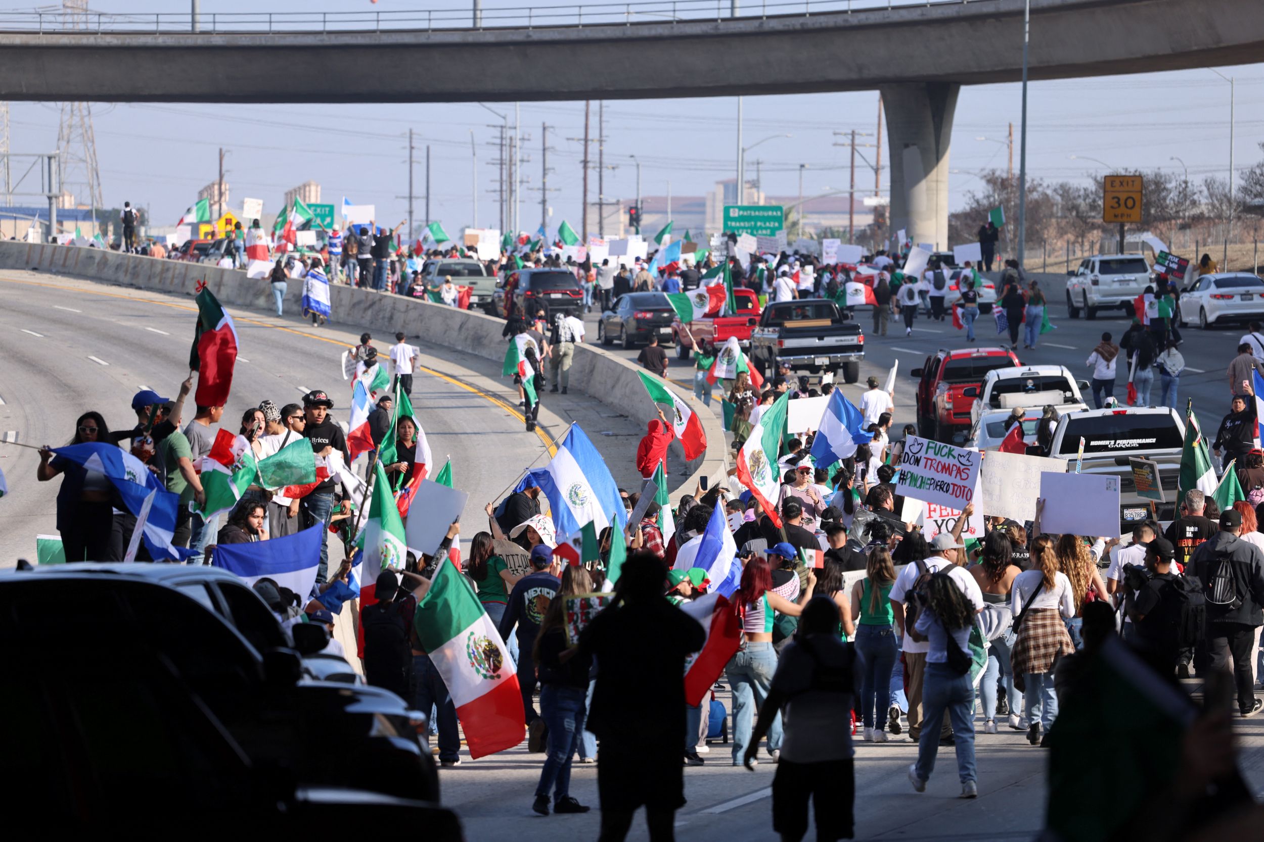 Protesters Holding Mexican Flags Block Los Angeles…