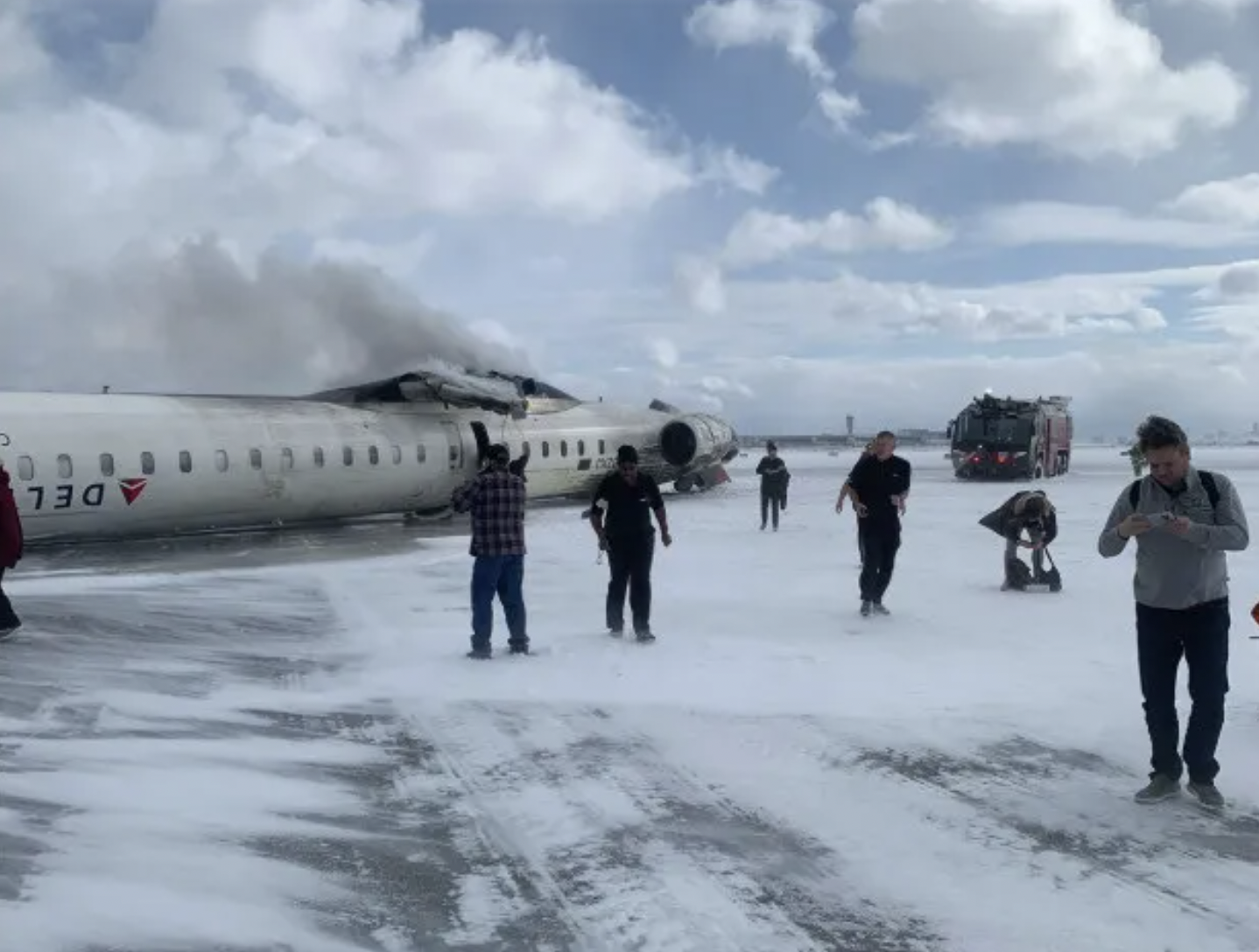 Delta Plane Flips Upside Down In Toronto Crash At