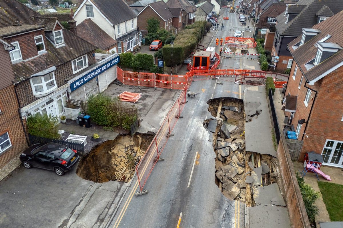 Second sinkhole opens in Surrey village as residents…