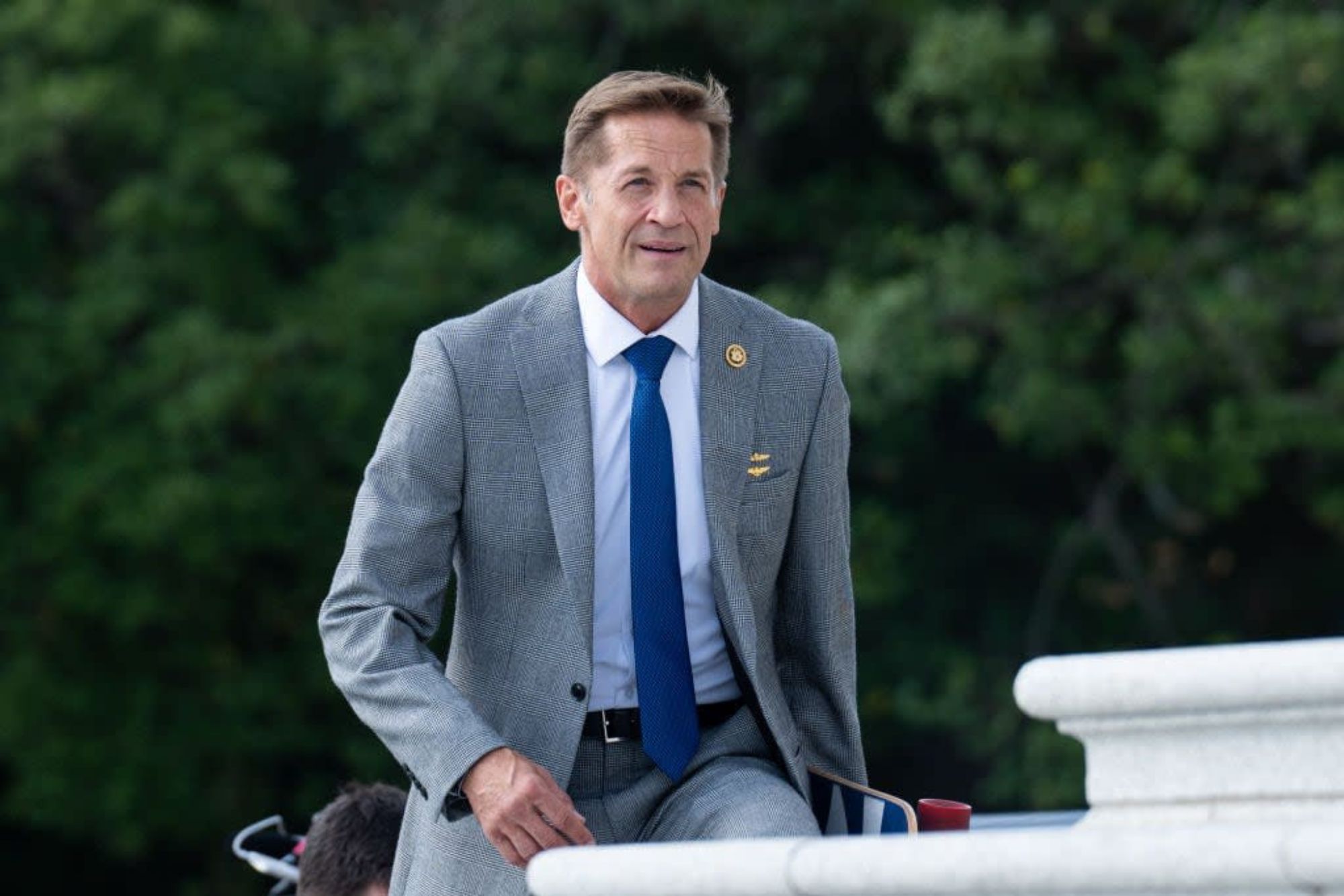 Angry Crowd Slams Republican Congressman for Backing…