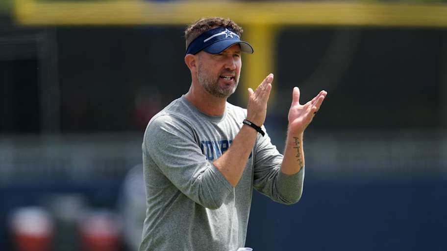 Sports Illustrated - Brian Schottenheimer Tips Cap to…
