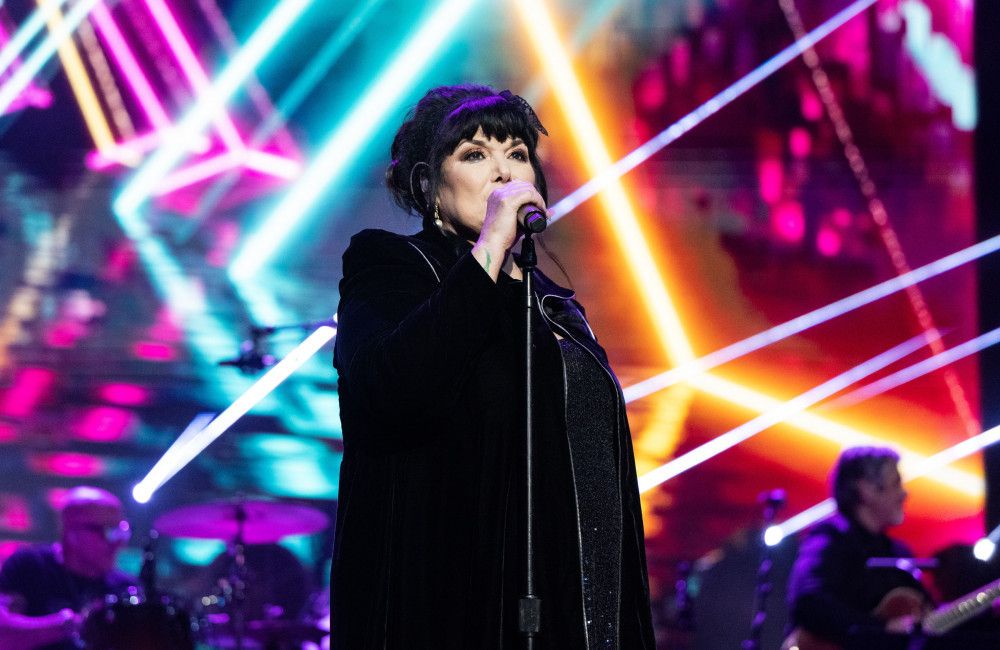 Heart's Ann Wilson performing in a wheelchair after…
