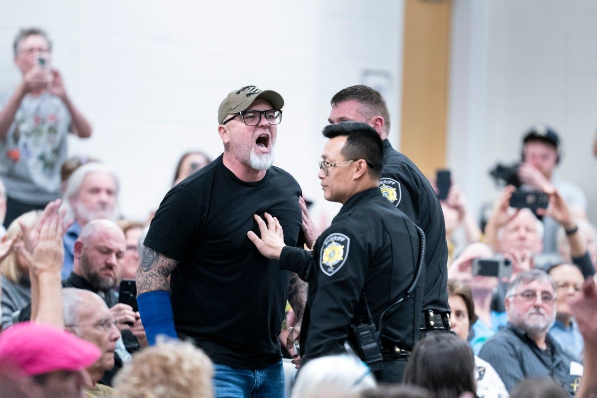 Vet who was escorted out of a town hall after ranting…