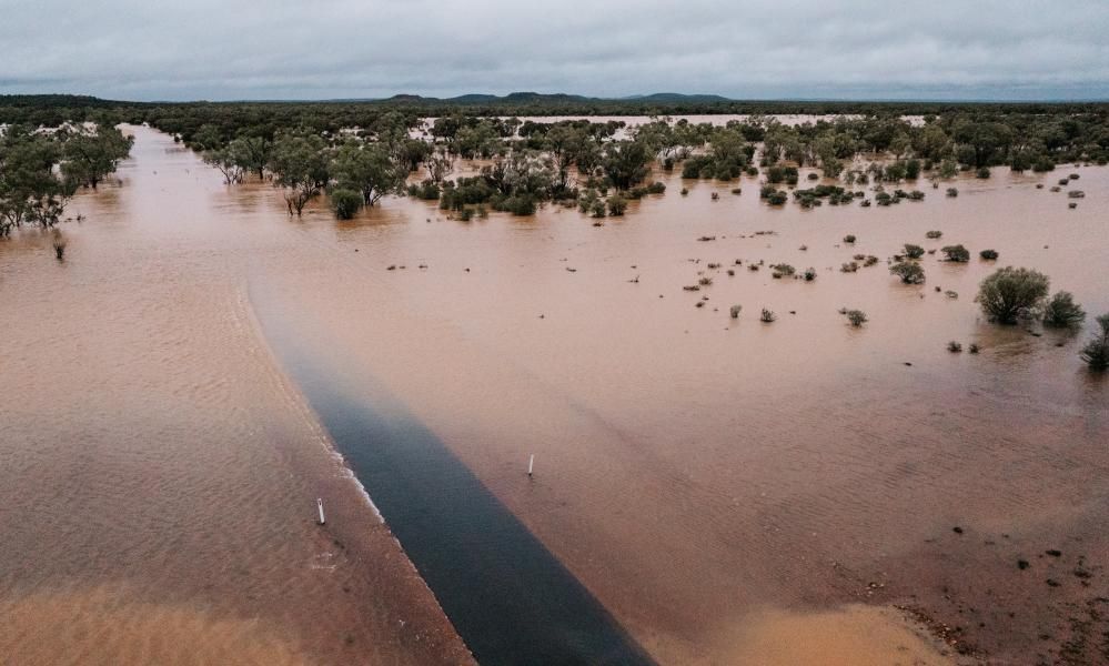 Queensland communities cut off by flood waters after…