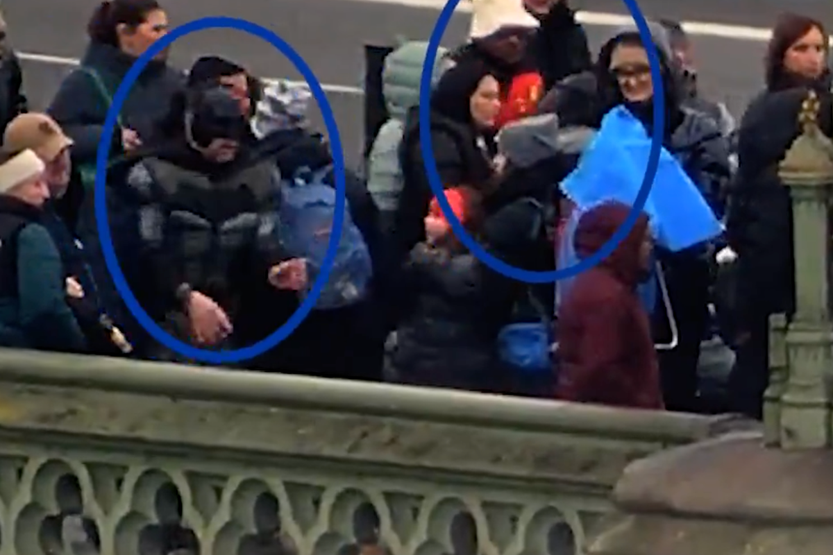 Police officers dress up as Batman and Robin in…