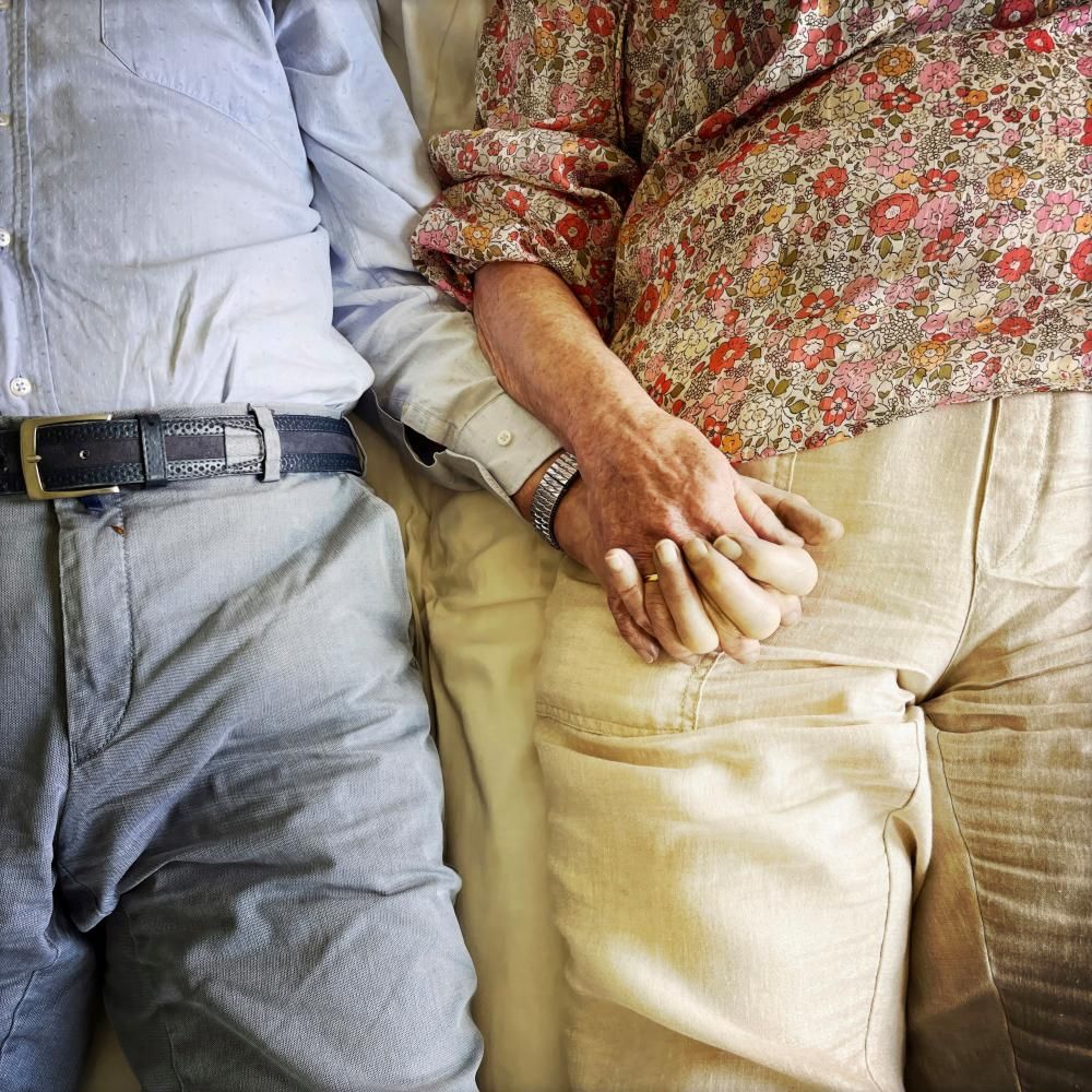 My parents holding hands after their assisted deaths:…