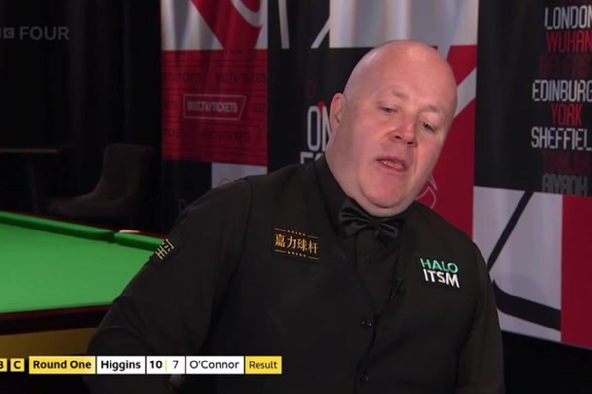 Snooker champion John Higgins comforted by BBC…