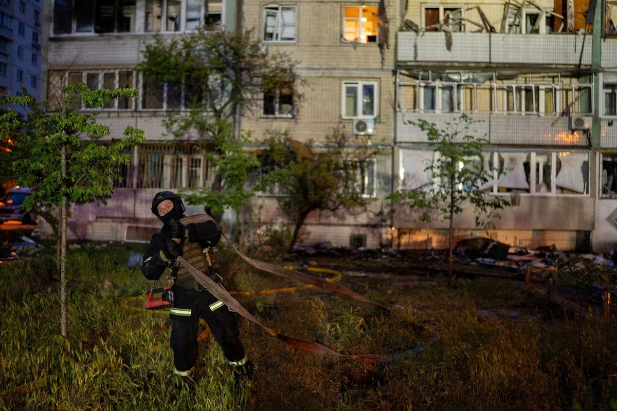 Emergency crews search Kyiv building after Russia…