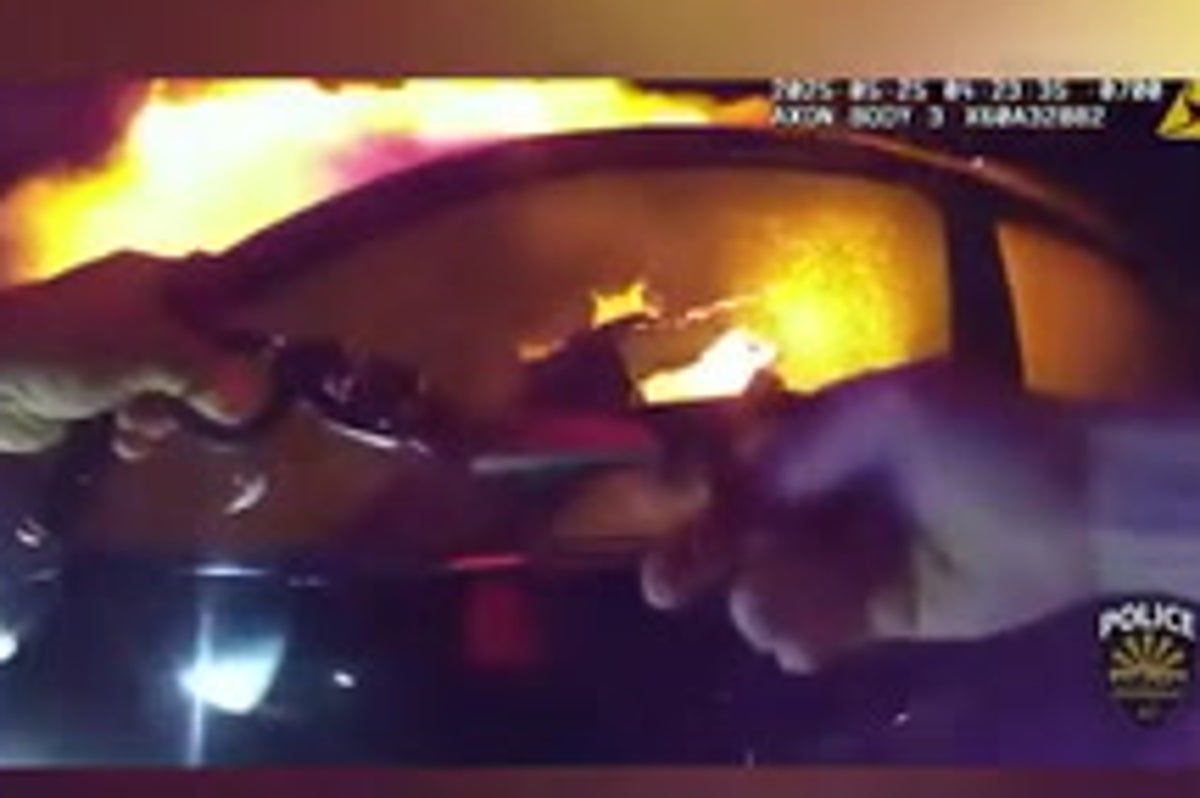 Terrifying footage shows hero cop rescuing fire…