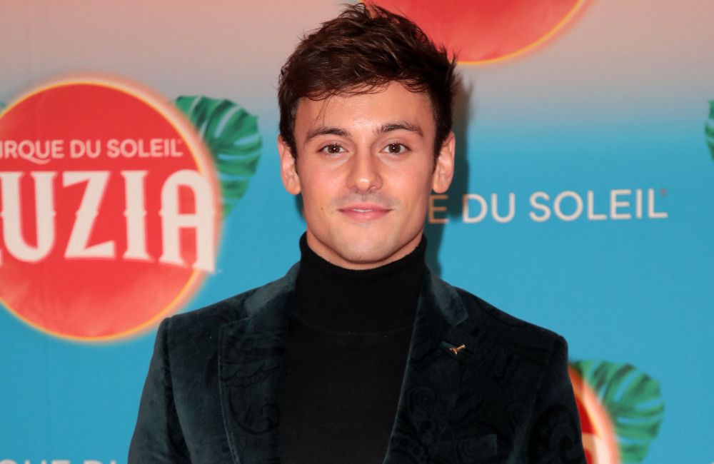 Tom Daley speaks out about his father's death as he…