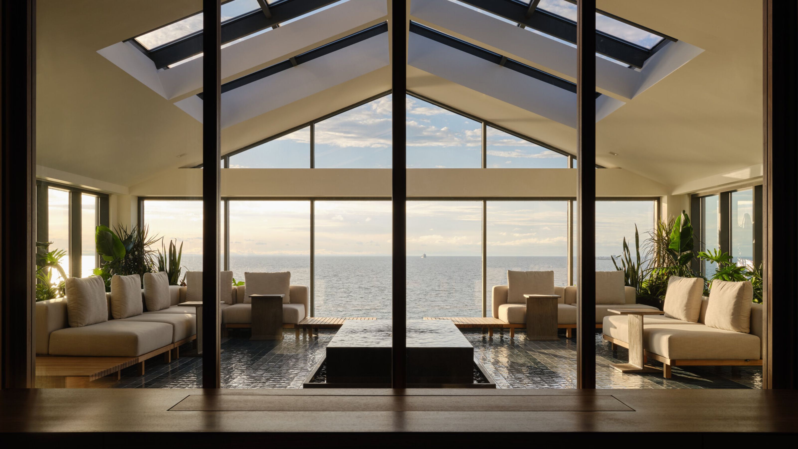 A Lattice-Wrapped Wooden Core Anchors This Over 10,000…