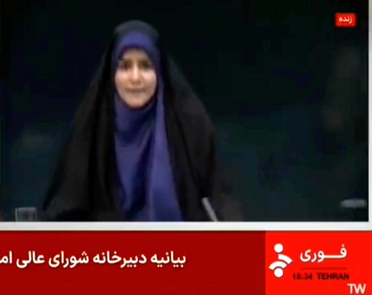 The Latest Breaking News on Iranian TV presenter runs for cover as ...