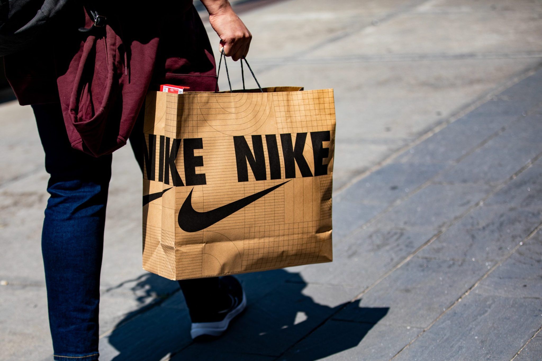 Why Nike stock is soaring despite a looming…