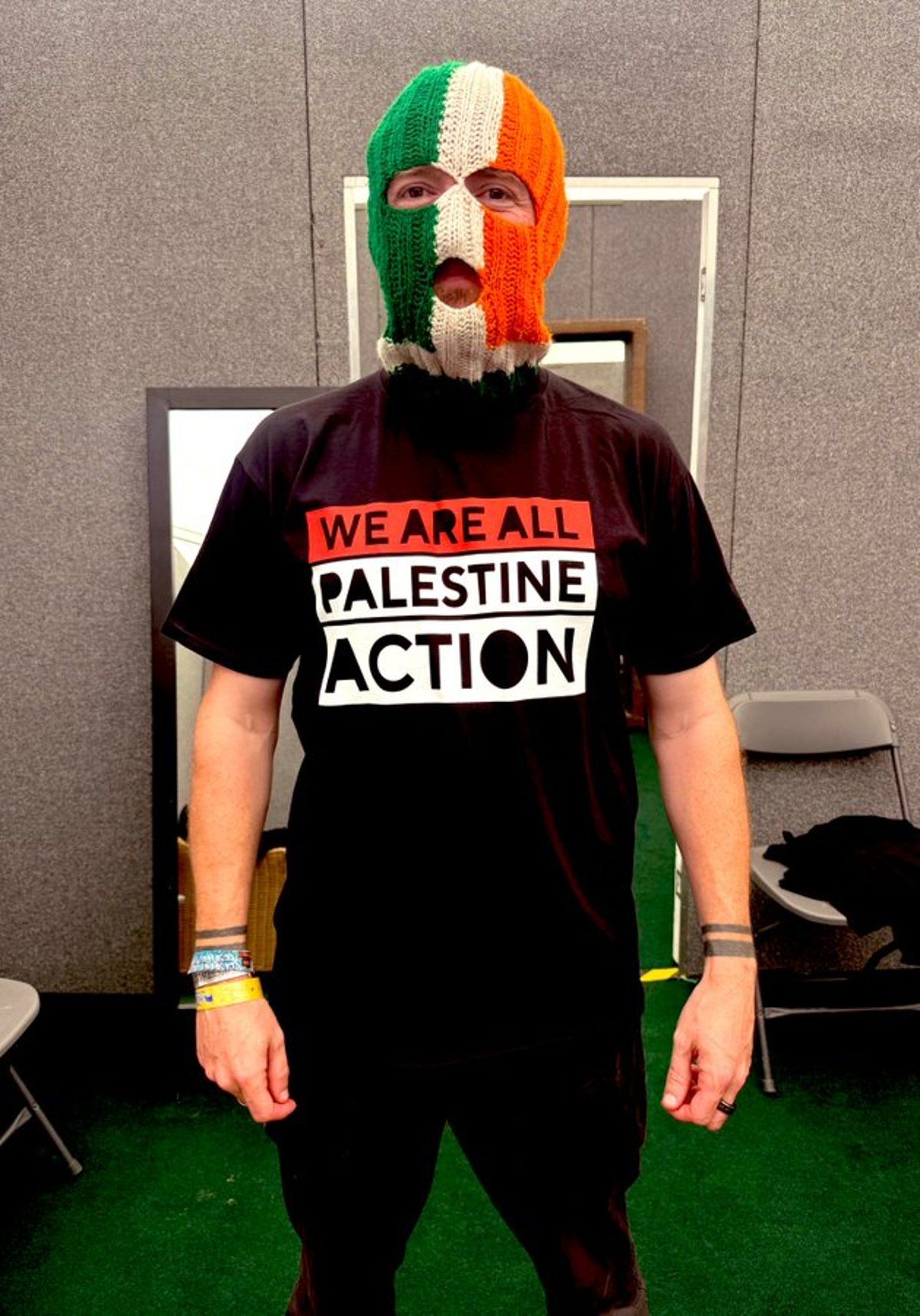 Kneecap rapper JJ Ó Dochartaigh wears Palestine Action…