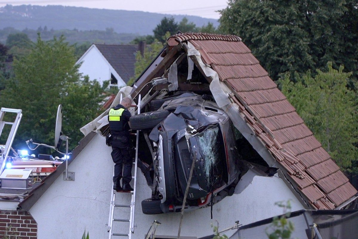Car crashes into a barn's roof in Germany, seriously…