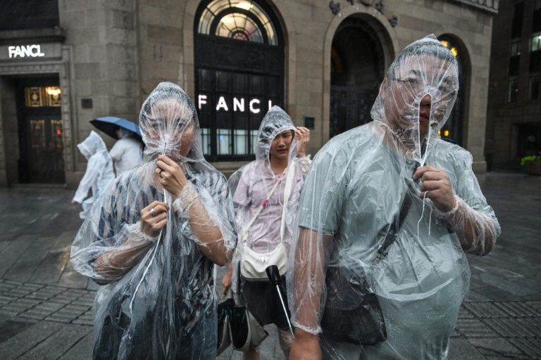Shanghai Evacuates 283,000 People As Typhoon Hits