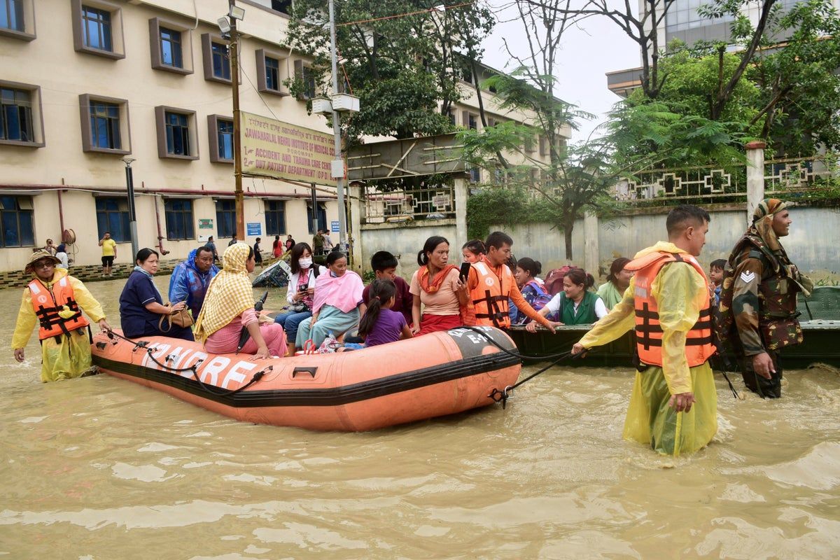 More than 50 people missing after flash floods wash…