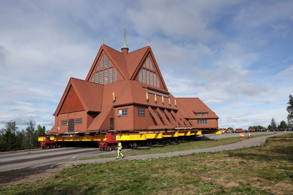 Iconic wooden church slowly inched down Arctic road