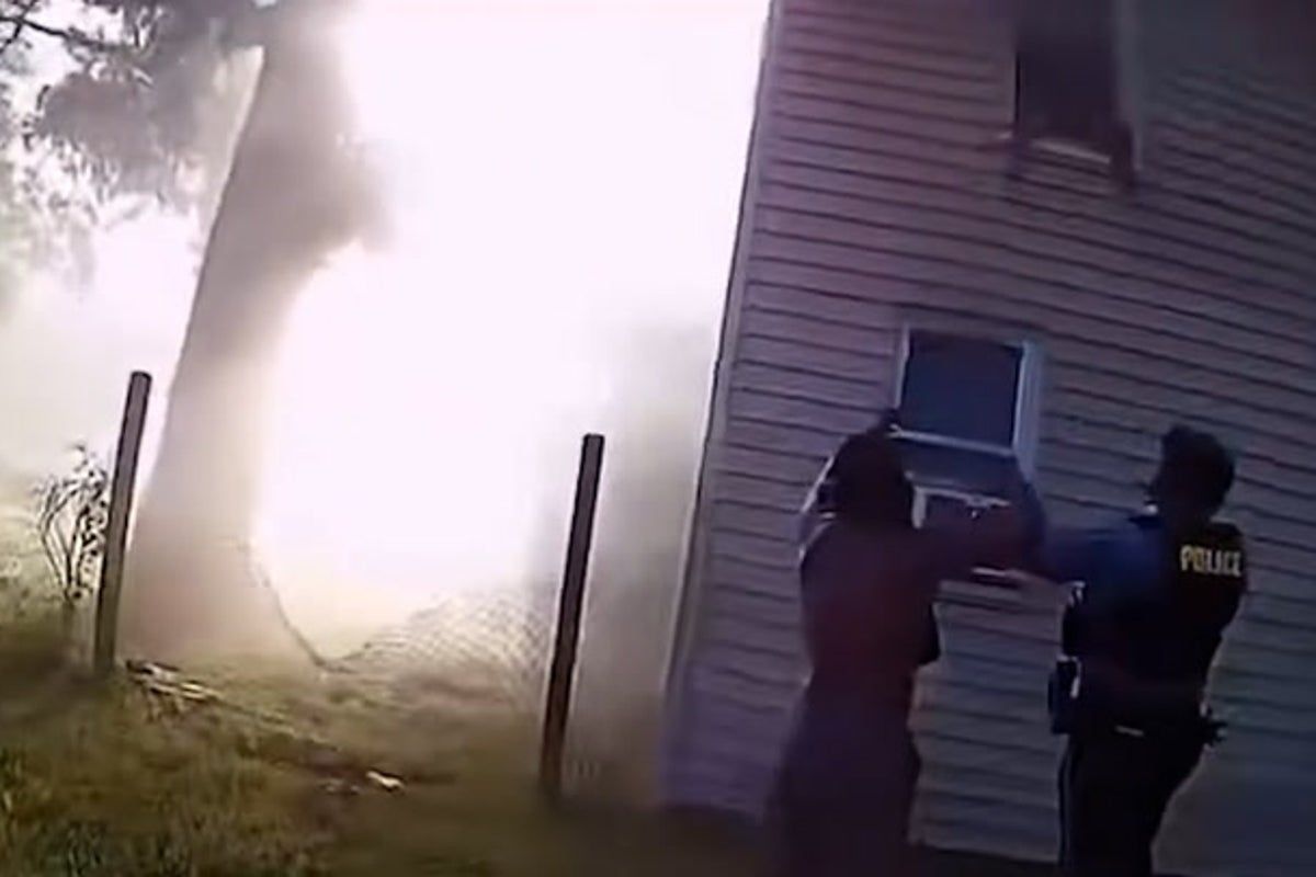 Heart-stopping moment police catch child jumping from…