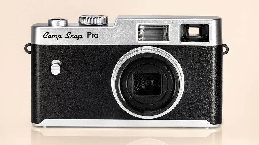 This retro compact camera has no screen, vintage…