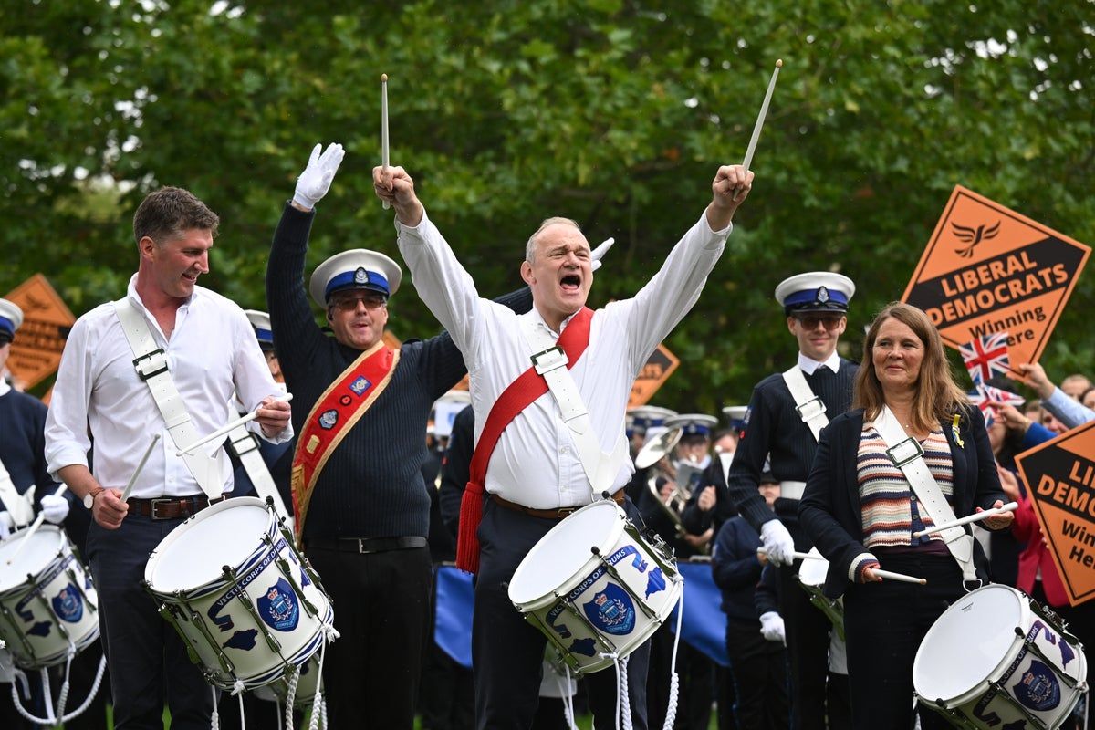 Ed Davey kicks off Lib Dem conference twirling a baton…