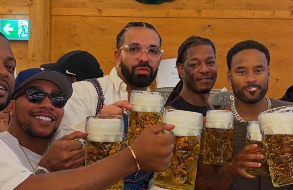 Drake trades his beloved champagne for beer steins at…