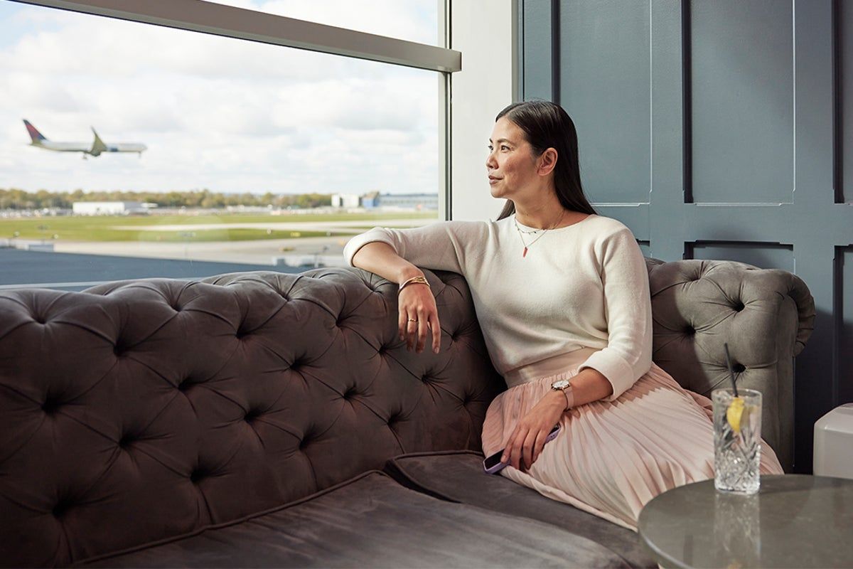 What is Priority Pass and how can I get lounge access?